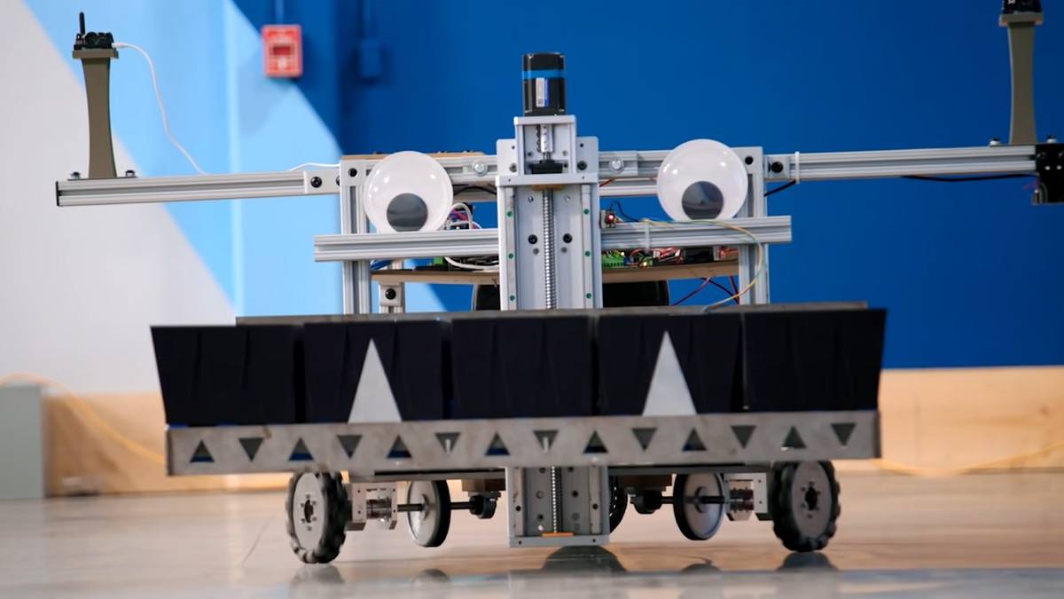 Watch This Ridiculous Robot Lay 100,000 Dominos In A Single Day
