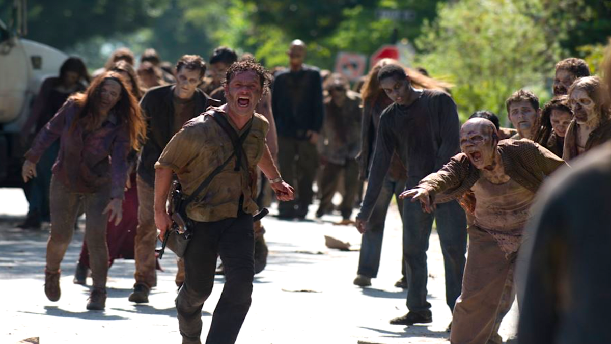 Rick & Michonne Run For Their Lives In Walking Dead Spinoff Set Photo