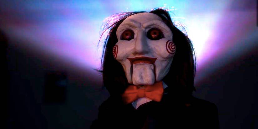The Tragic Backstory Behind Saw's Billy The Puppet