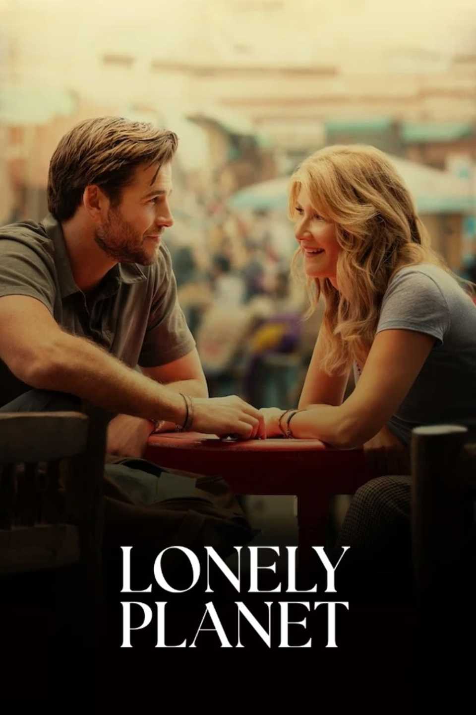 Lonely Planet Review: Laura Dern & Liam Hemsworth Want To Be Unstuck In Netflix's Romantic Drama