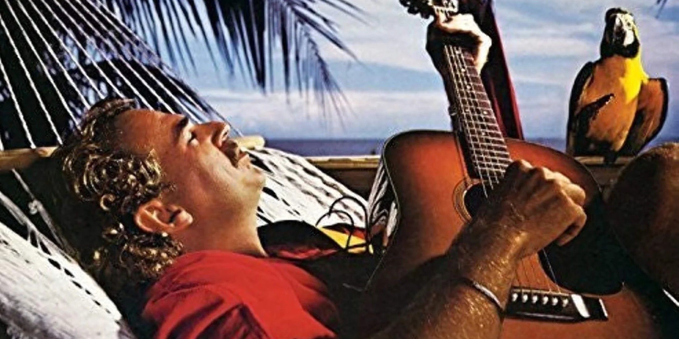 8 Jimmy Buffett Songs That Are Essential For Your Summer Playlist